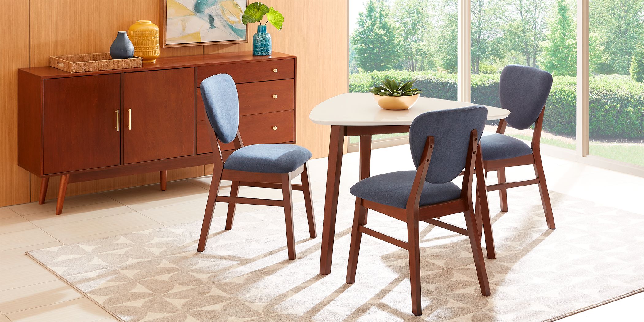 Melodina White 4 Pc Dining Room with Sky Chairs - Rooms To Go